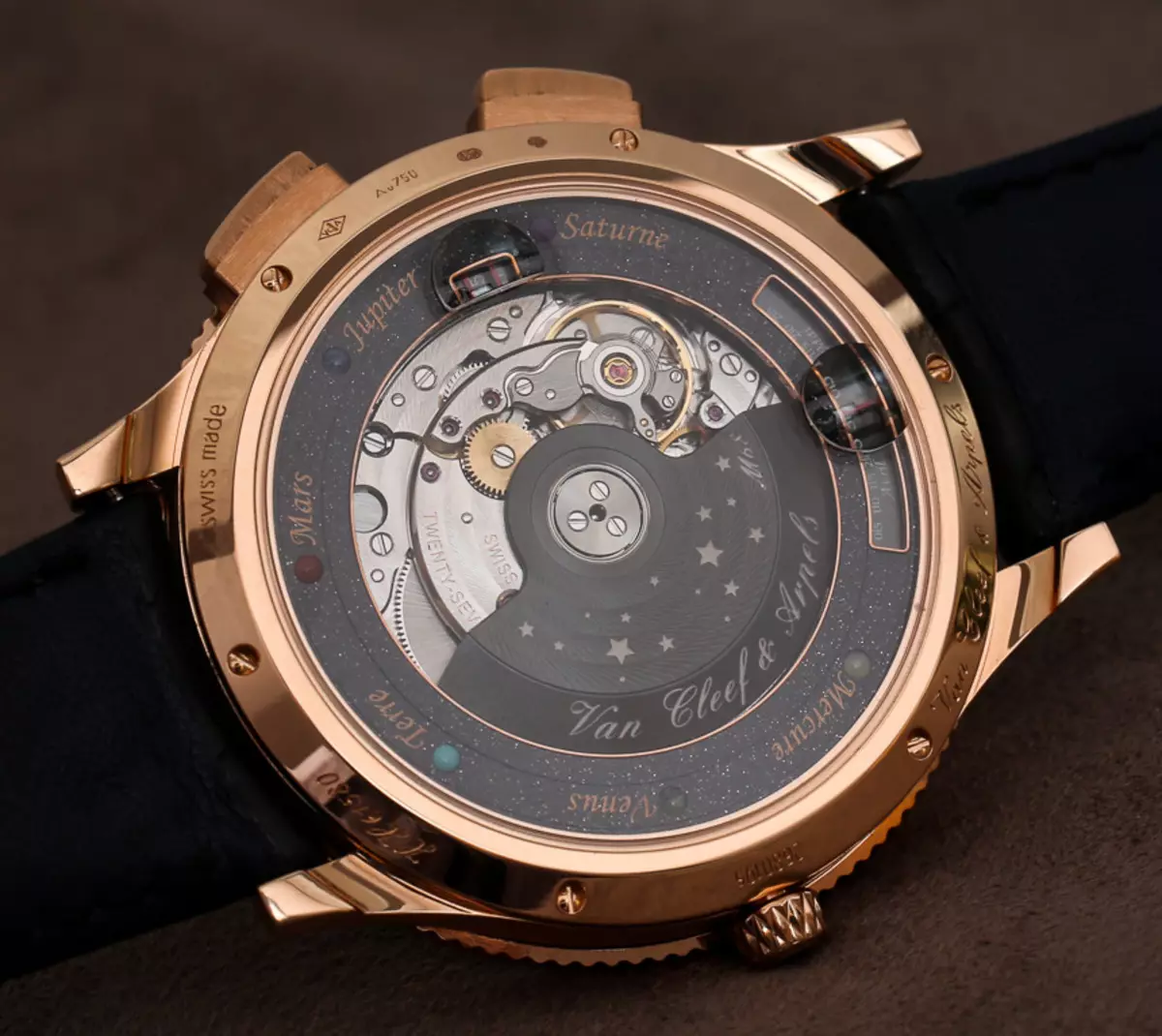 On the reverse side of Complication Poétique Midnight Planétarium there is an eternal calendar and legend