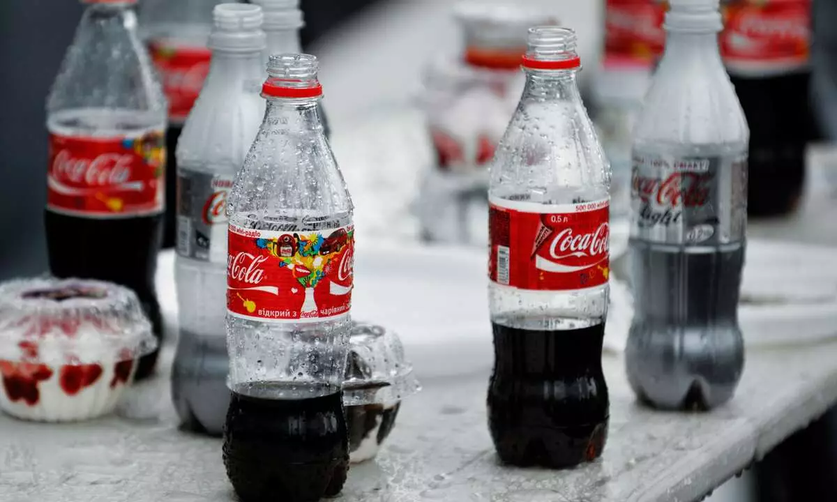 Hvernig Coca-Cola hvetur sorp vinnslu